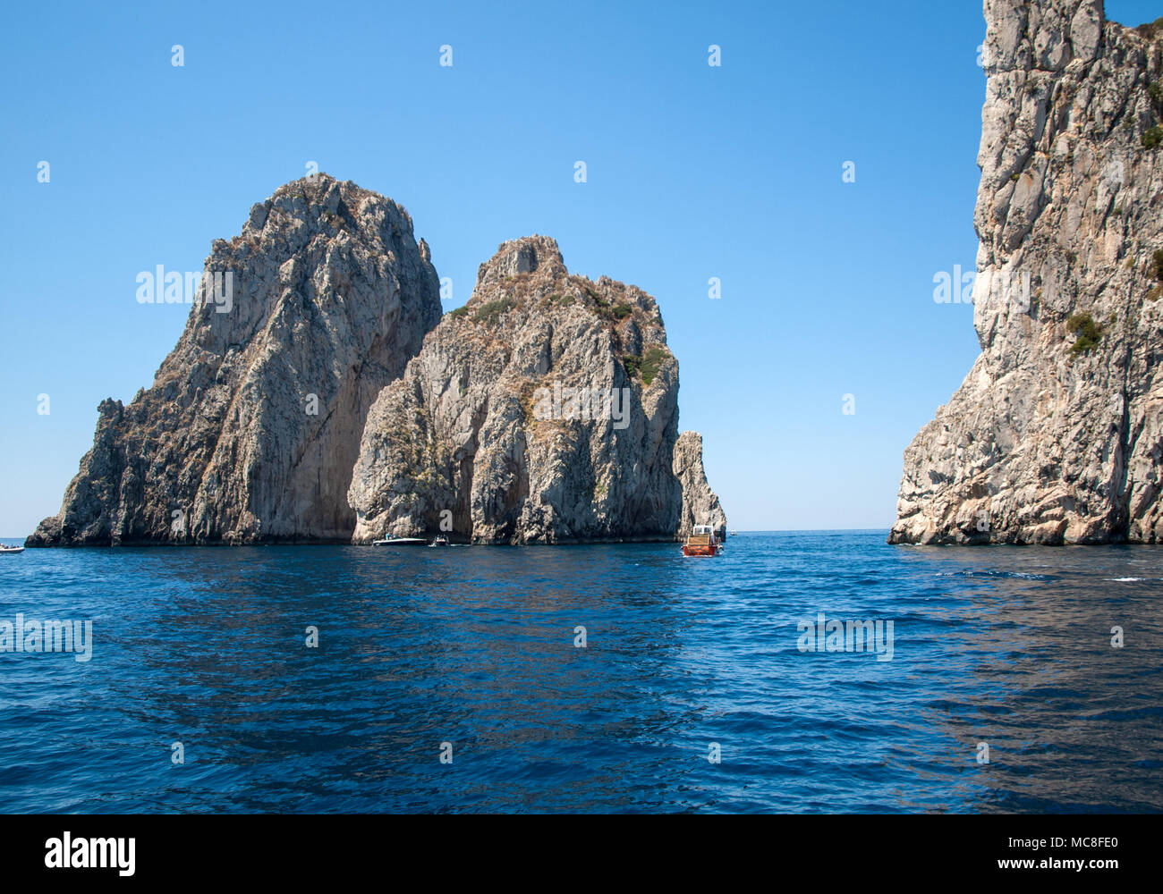 View from the boat on the Faraglioni Rocks on Capri Island, Italy Stock ...