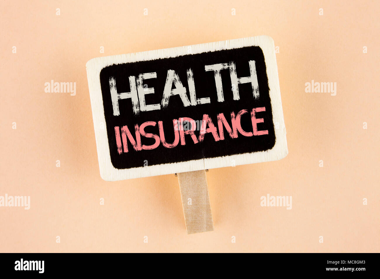 Handwriting text Health Insurance. Concept meaning Health insurance ...