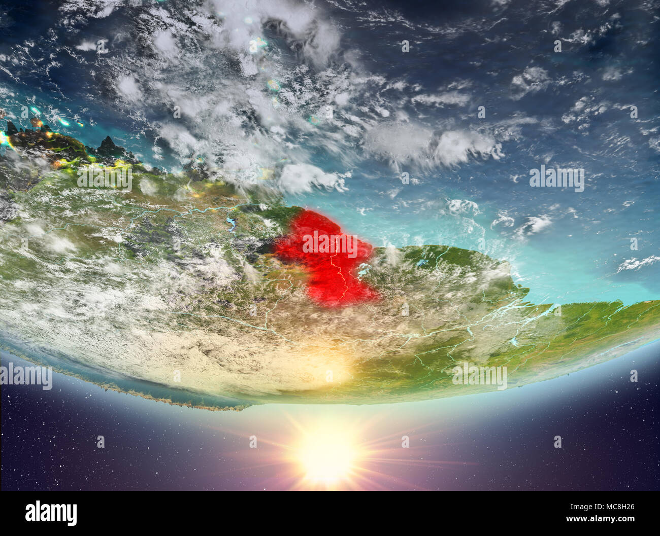 Guyana during sunrise highlighted in red on planet Earth with clouds ...