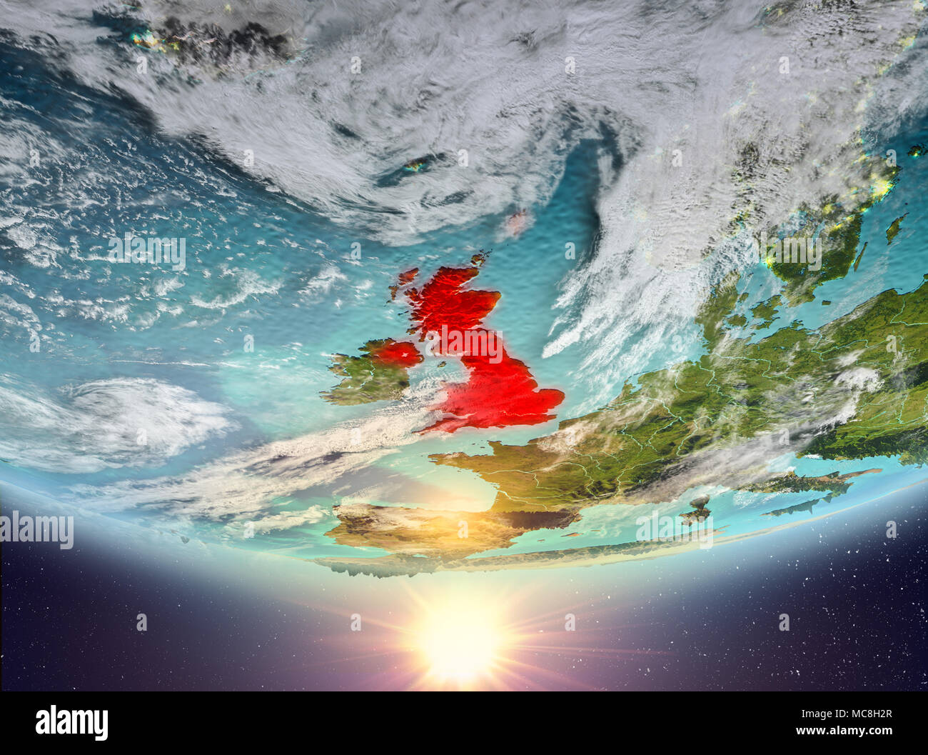 United Kingdom during sunrise highlighted in red on planet Earth with ...