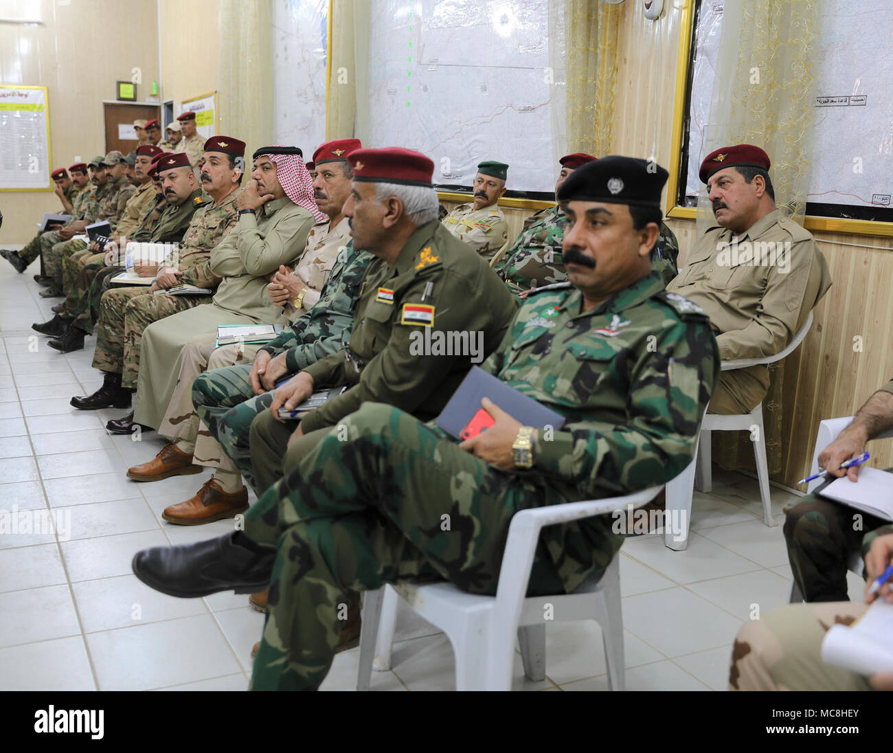 Iraqi security force key leaders conduct a key leader engagement at ...