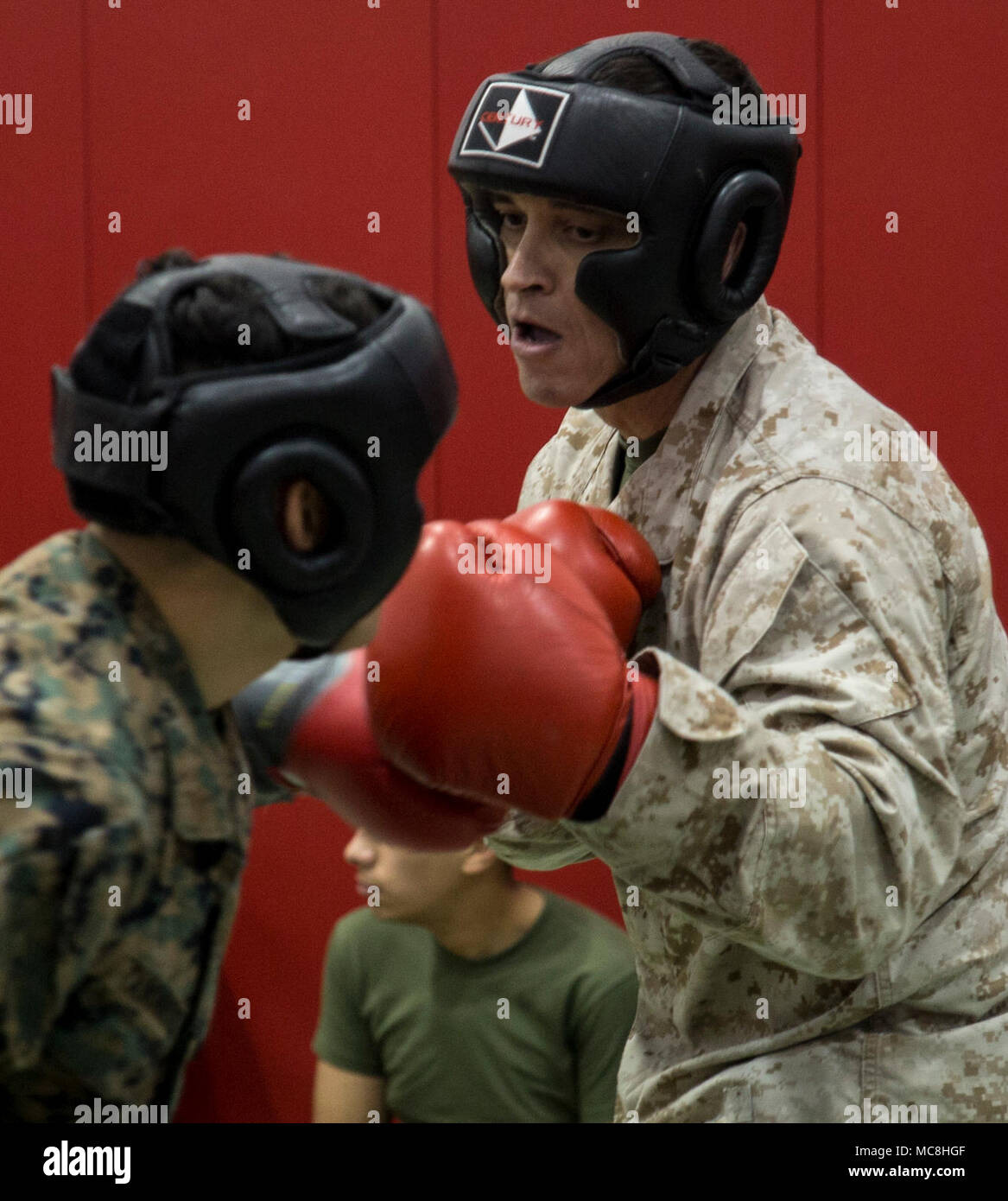 Col. Charles B. Dockery and Lance Cpl. Jose C. Tanonreyes kick box ...