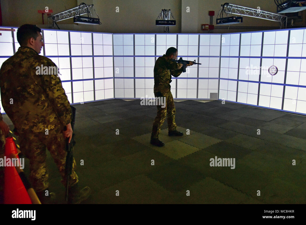 An Italian Army Soldier, participates in a simulated shooting drill at ...
