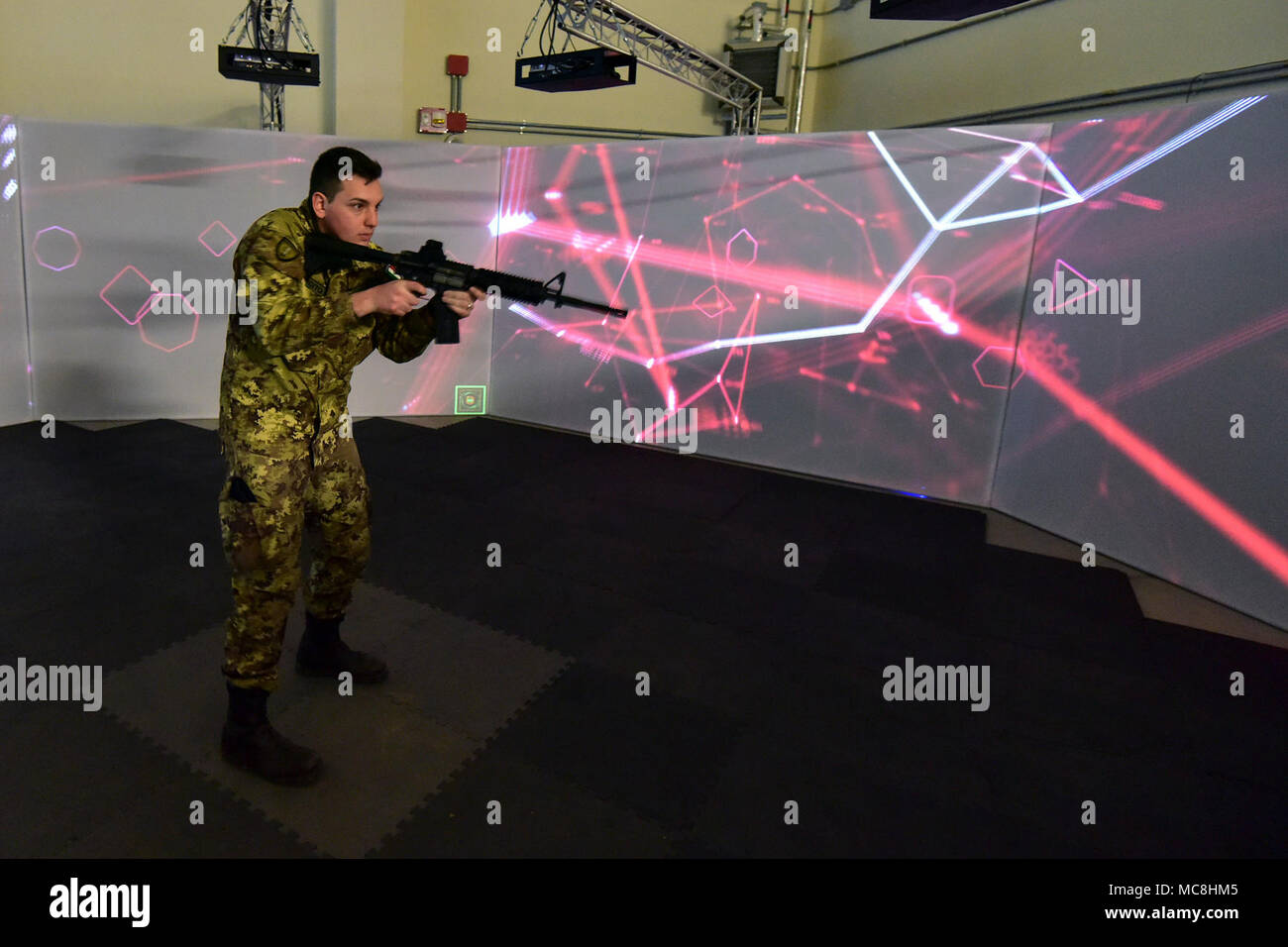 An Italian Army Soldier, participates in a simulated shooting drill at ...
