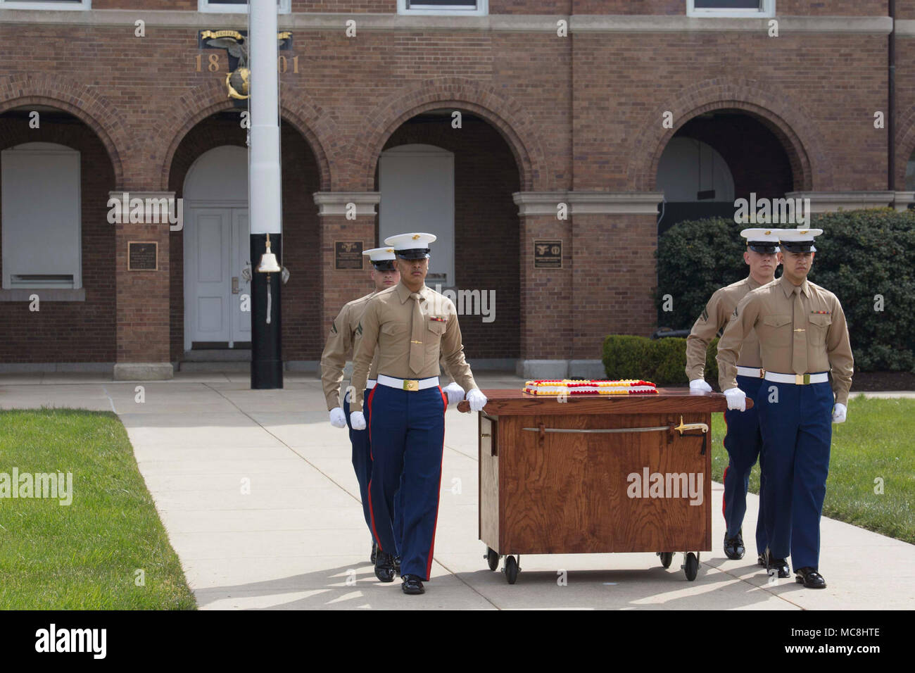 Barracks’ Marines march out with the birthday cake to commemorate the ...
