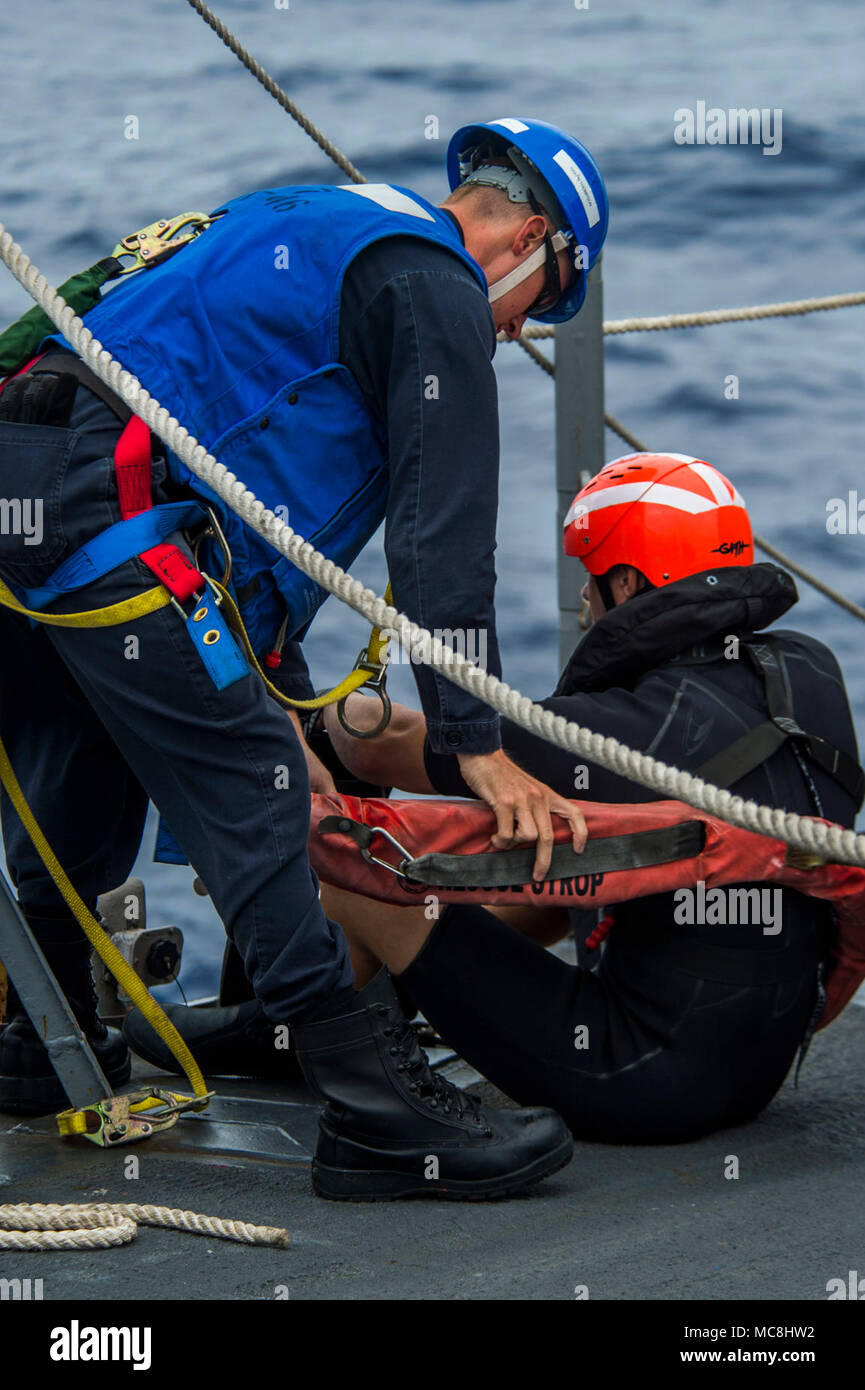OCEAN (Mar 29, 2018) Boatswain’s Mate 2nd Class Nicholas Poole helps ...