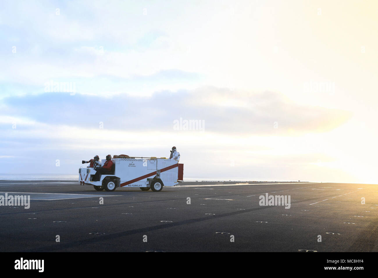 US Navy aircraft carrier, flight deck crew at work Stock Photo - Alamy