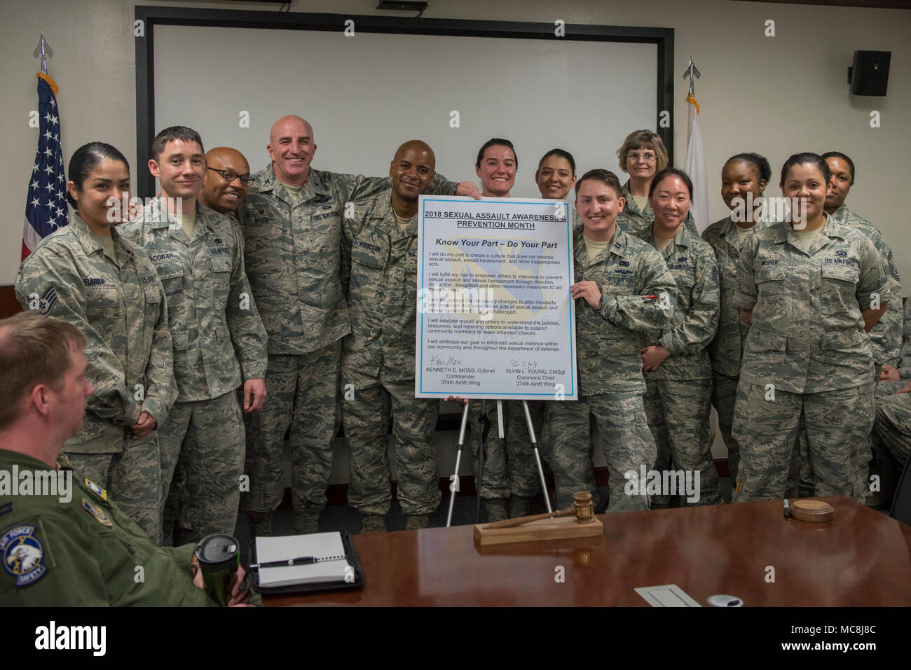 Col. Kenneth E. Moss, 374th Airlift Wing commander, and Chief Master ...
