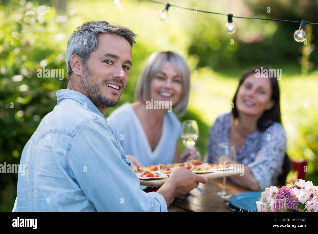 Friends Around Dining Table Home High Resolution Stock Photography and ...