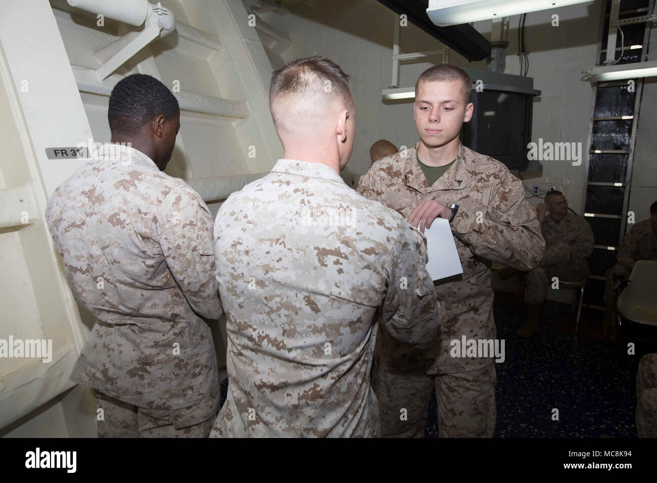 U.S. Marine Corps Lance Cpl. Joshua J. Kisil, a systems network ...