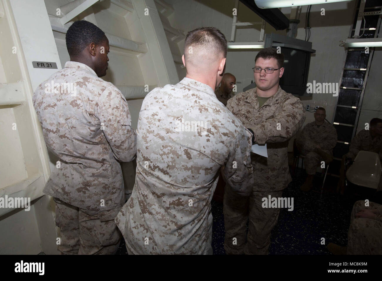 U.S. Marine Corps Lance Cpl. Ethan R. Powell, a systems network ...