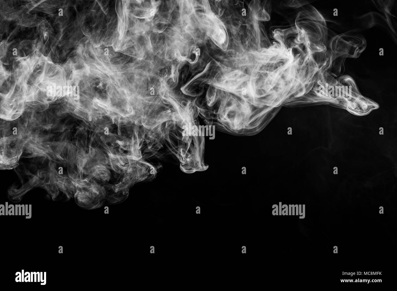 White smoke on black background Stock Photo - Alamy