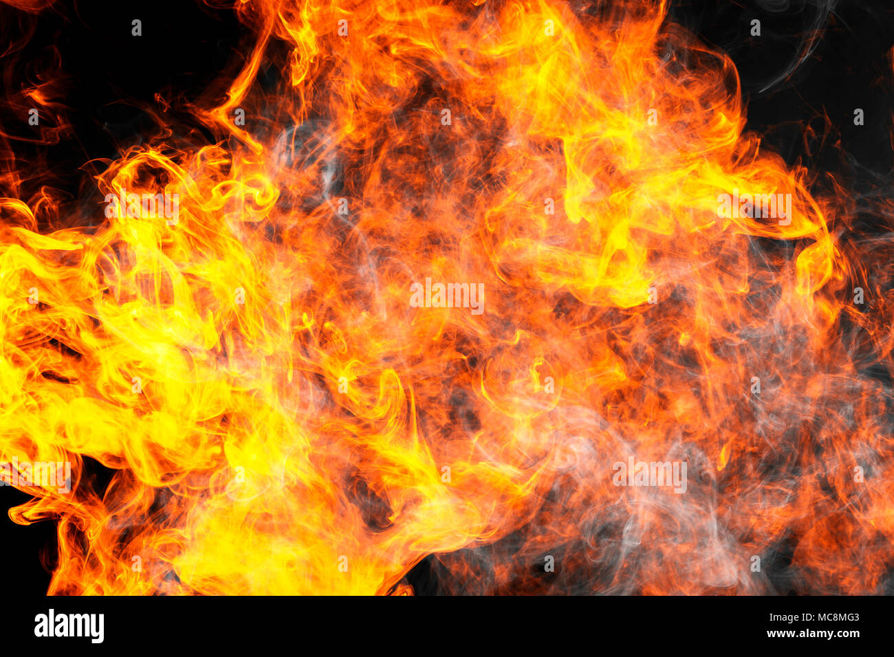 Fire flames background. Dense fiery smoke on a black isolated ...