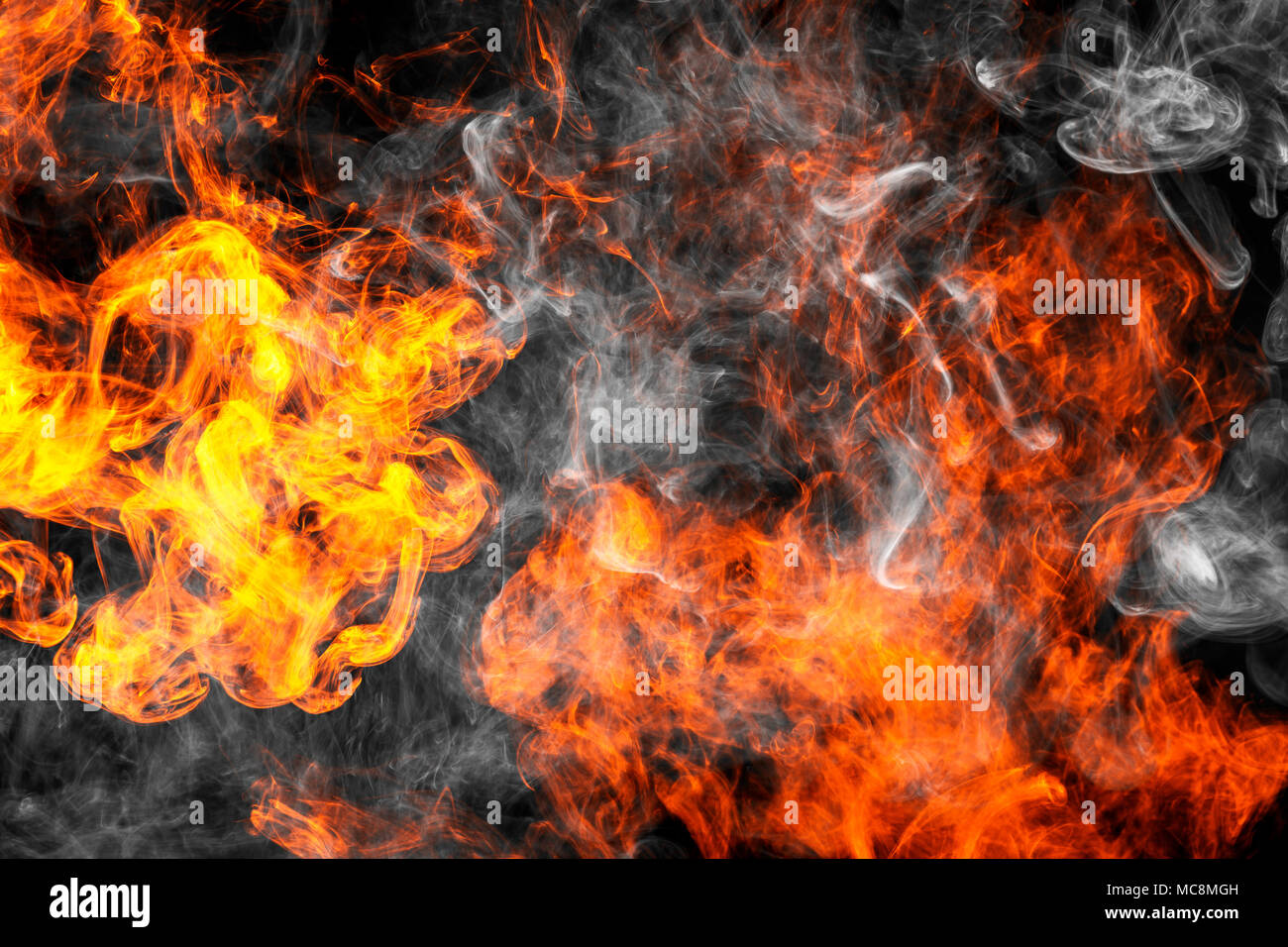 Fire flames background. Dense fiery smoke on a black isolated ...