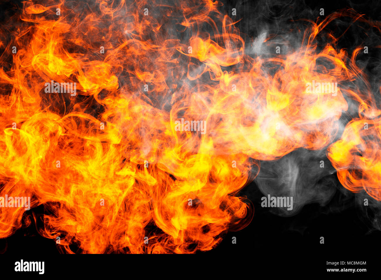 Fire flames background. Dense fiery smoke on a black isolated ...