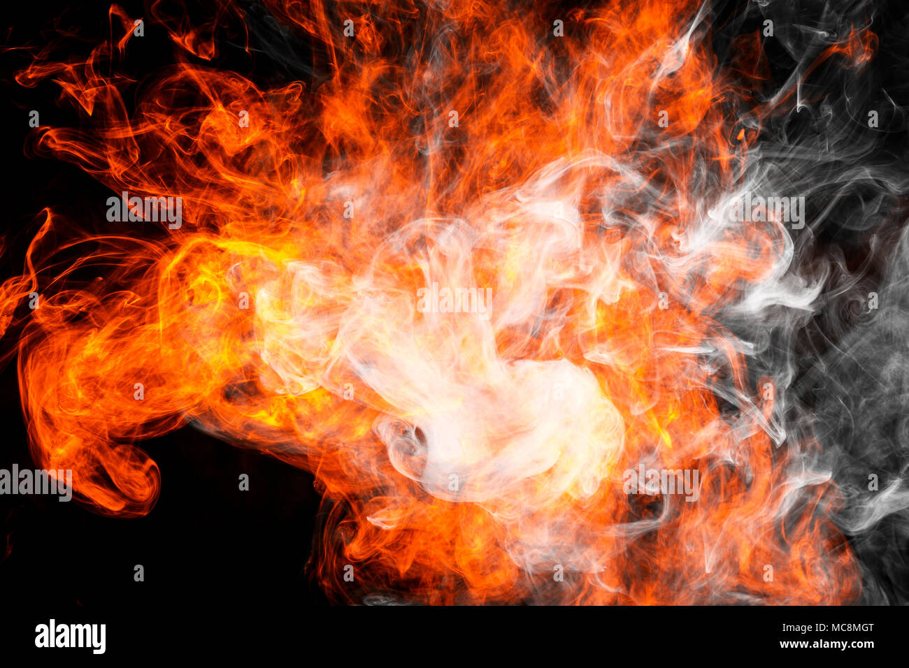 Fire flames background. Dense fiery smoke on a black isolated ...
