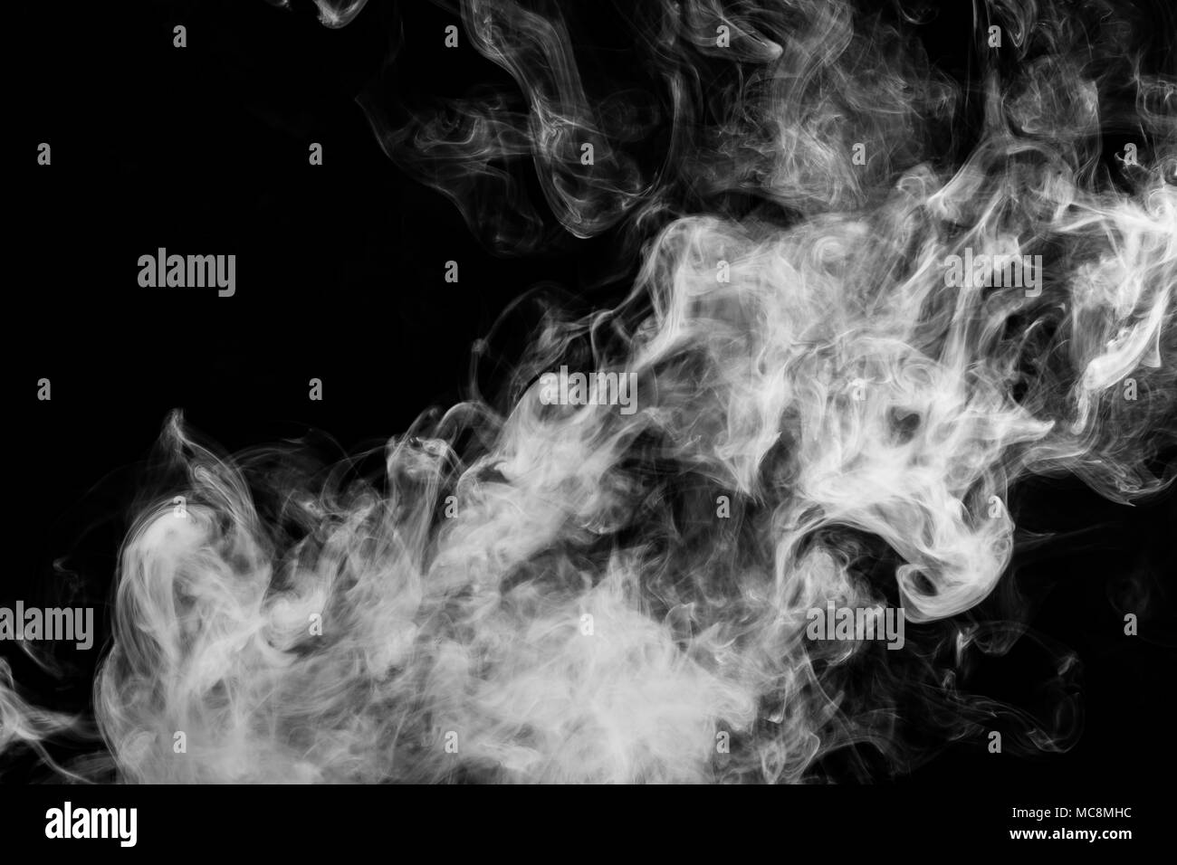 White cloud smoke on black isolated background Stock Photo - Alamy
