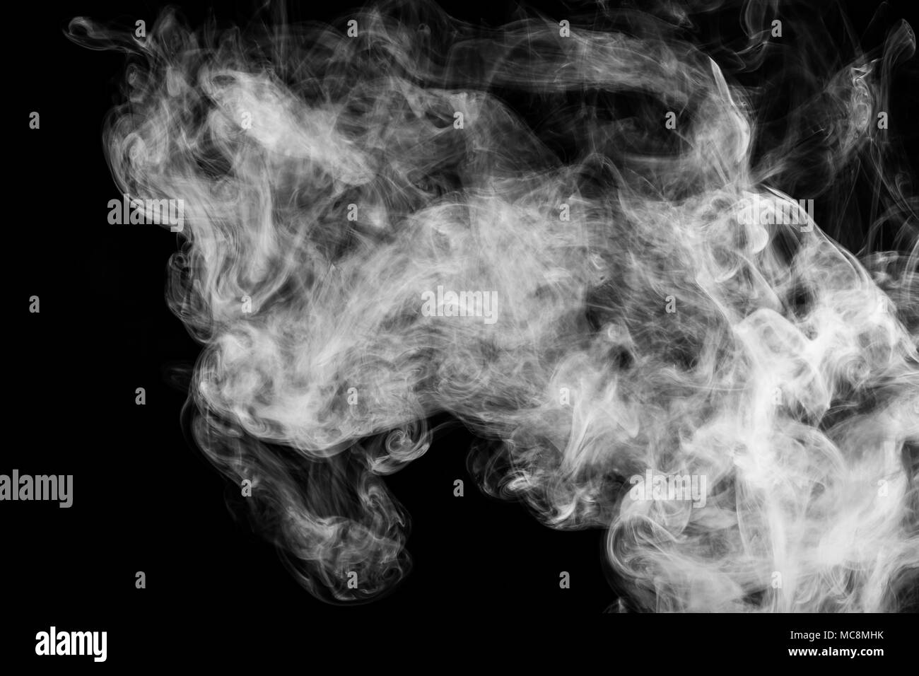 White cloud smoke on black isolated background Stock Photo - Alamy