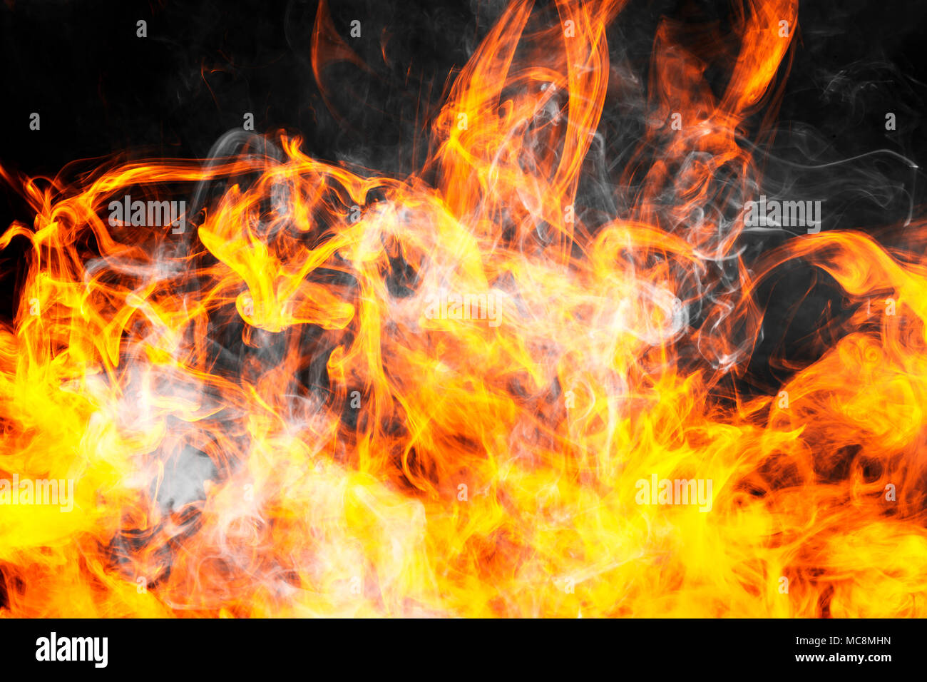 Fire flames background. Cloud of fiery smoke on a black isolated ...