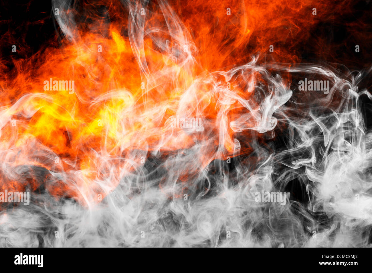 Fire flames background. Cloud of fiery smoke on a black isolated ...