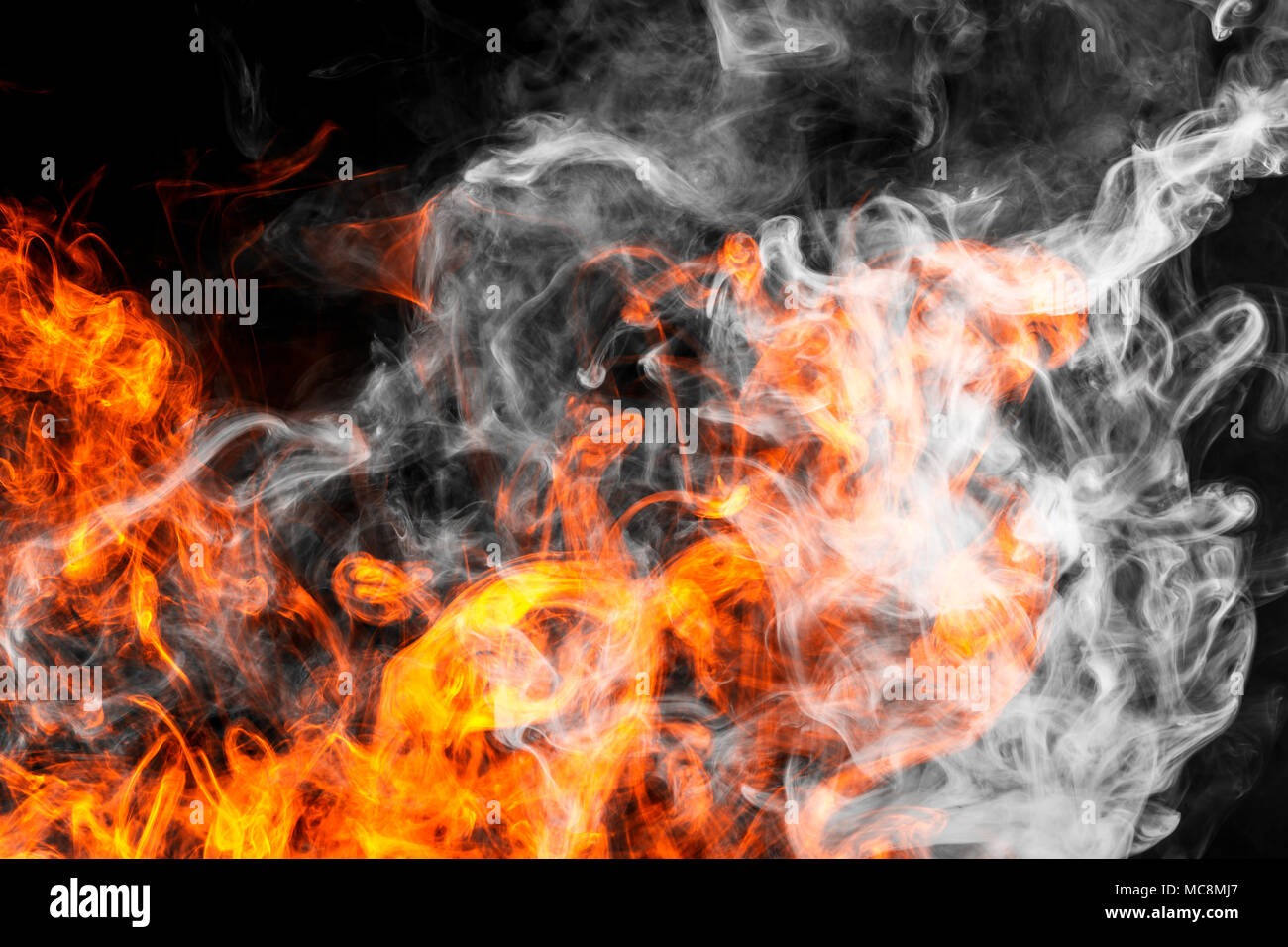 Fire flames background. Cloud of fiery smoke on a black isolated ...