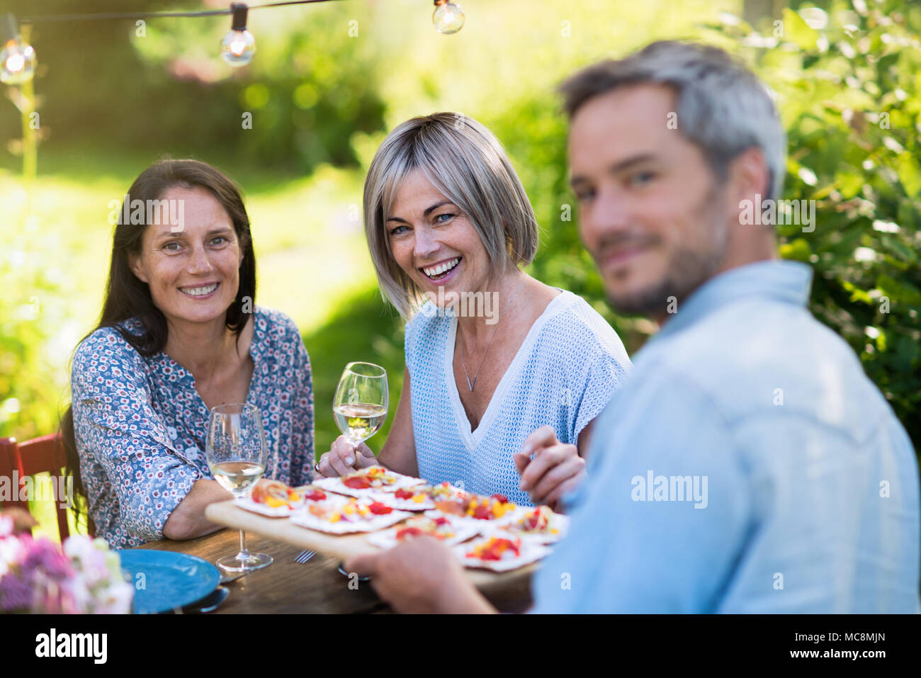 Friends Around Dining Table Home High Resolution Stock Photography and ...