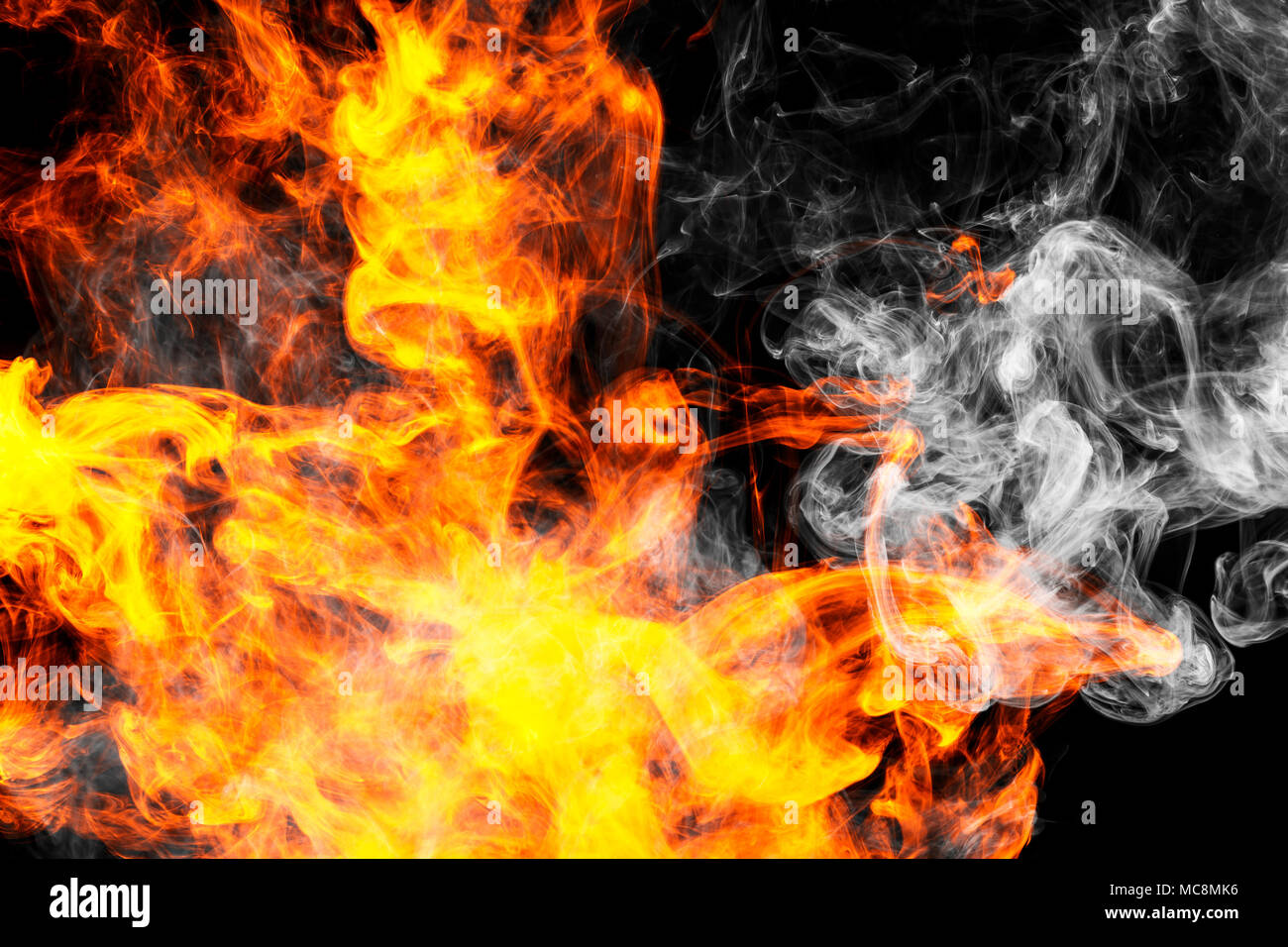 Fire flames background. Colorful fiery smoke on a black isolated ...