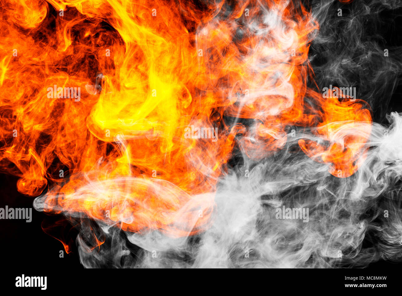 Fire flames background. Colorful fiery smoke on a black isolated ...
