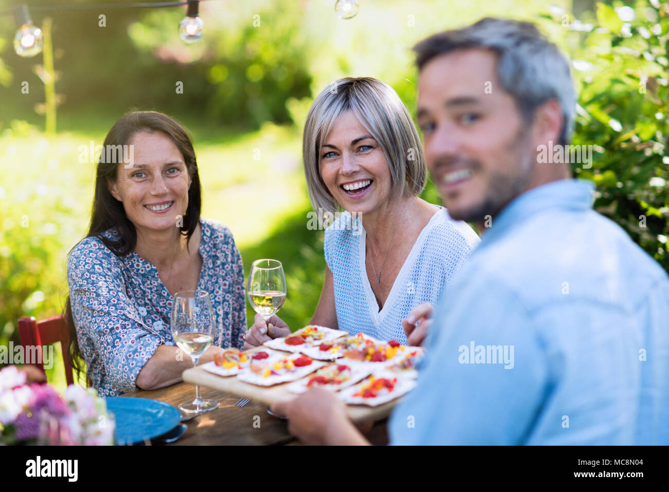 Friends Around Dining Table Home High Resolution Stock Photography and ...