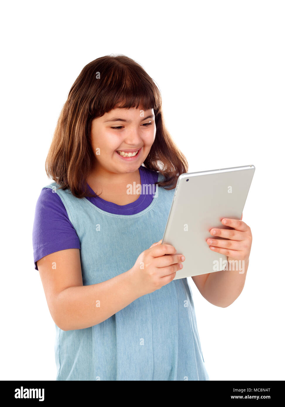 Beautiful child with a tablet isolated on a white background Stock ...