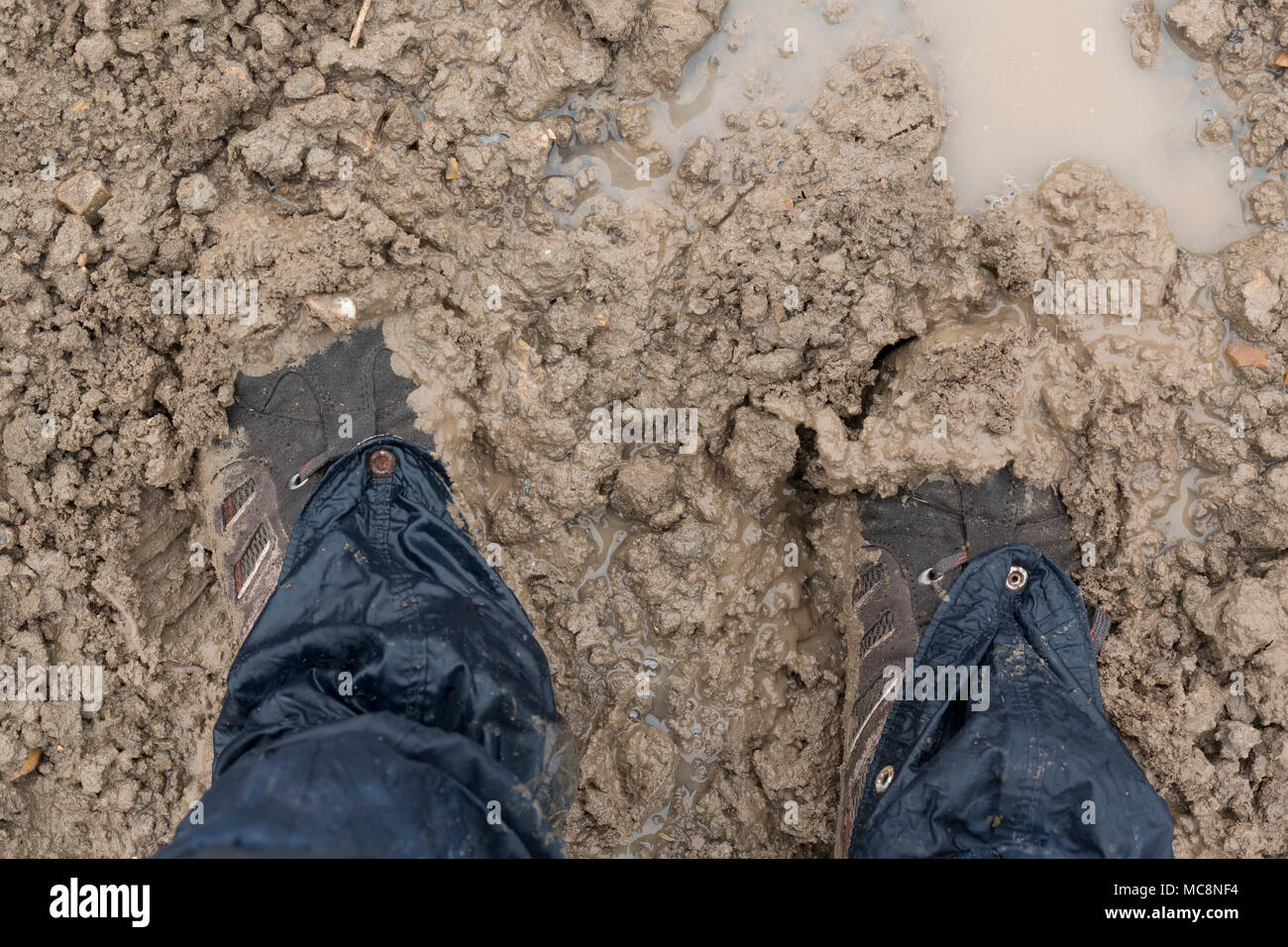 Rain boots mud hi-res stock photography and images - Alamy