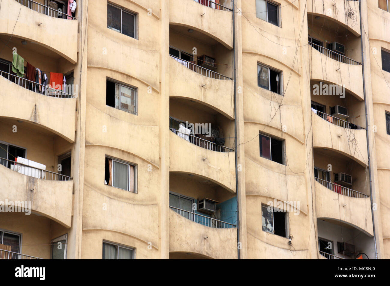 Messy balconies on an apartment building in Jeddah Stock Photo - Alamy
