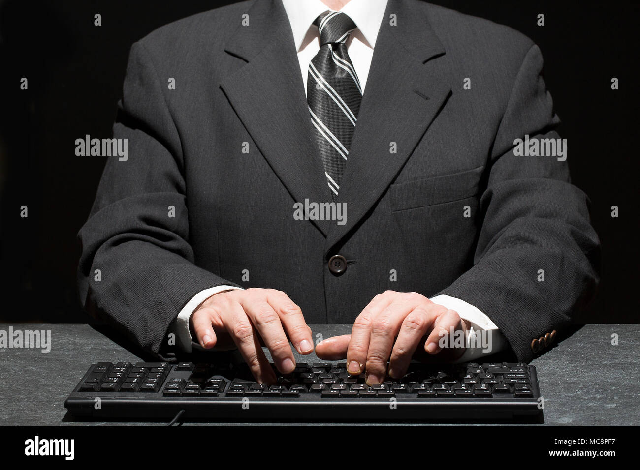 Online working man typing hi-res stock photography and images - Alamy