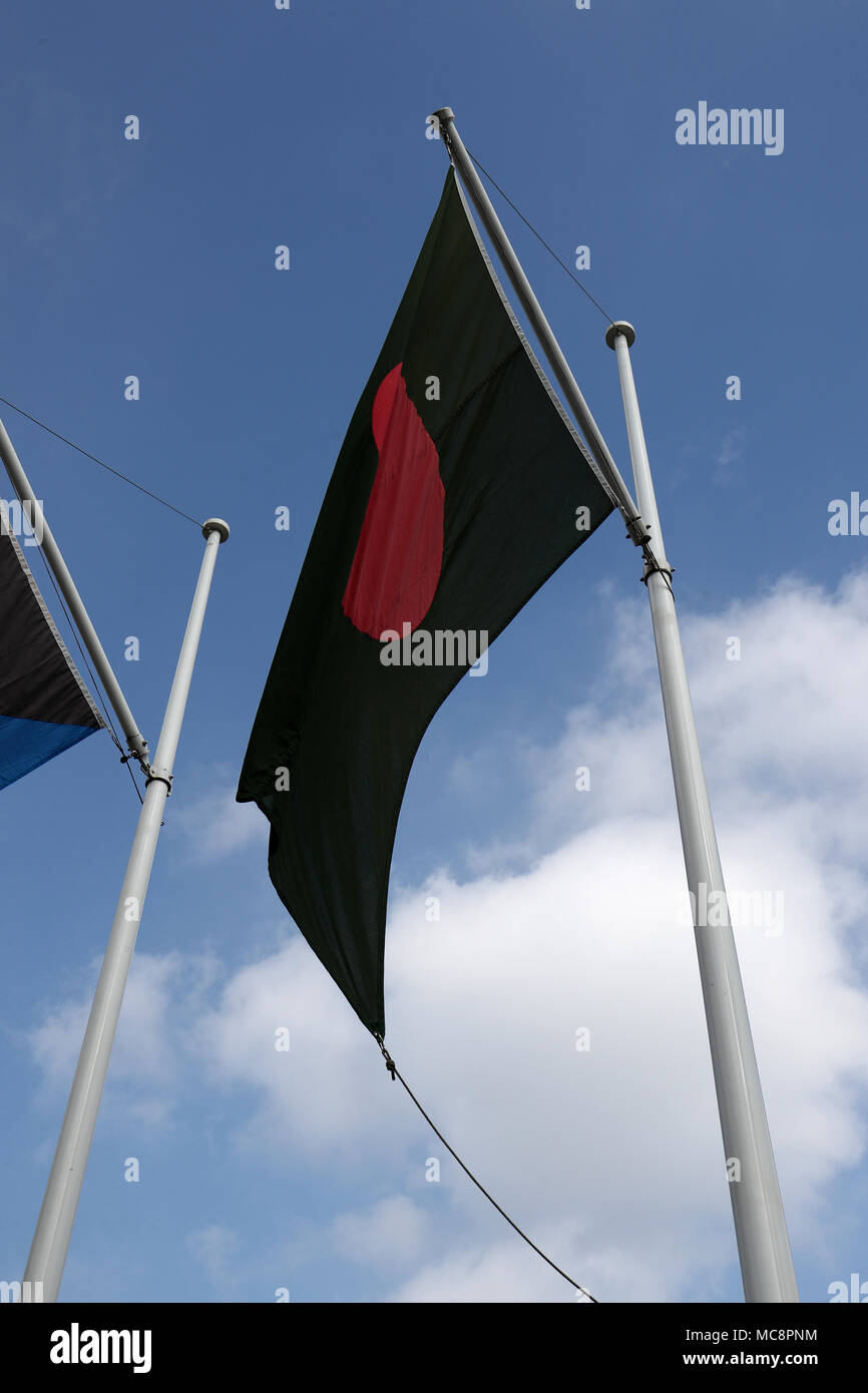 The flag of Bangladesh flies with other flags from countries of the ...