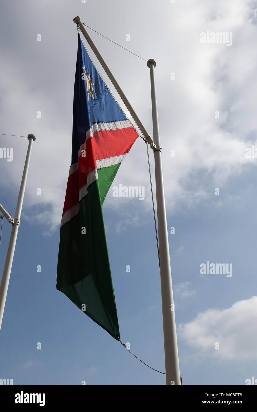 The flag of Namibia flies with other flags from countries of the ...