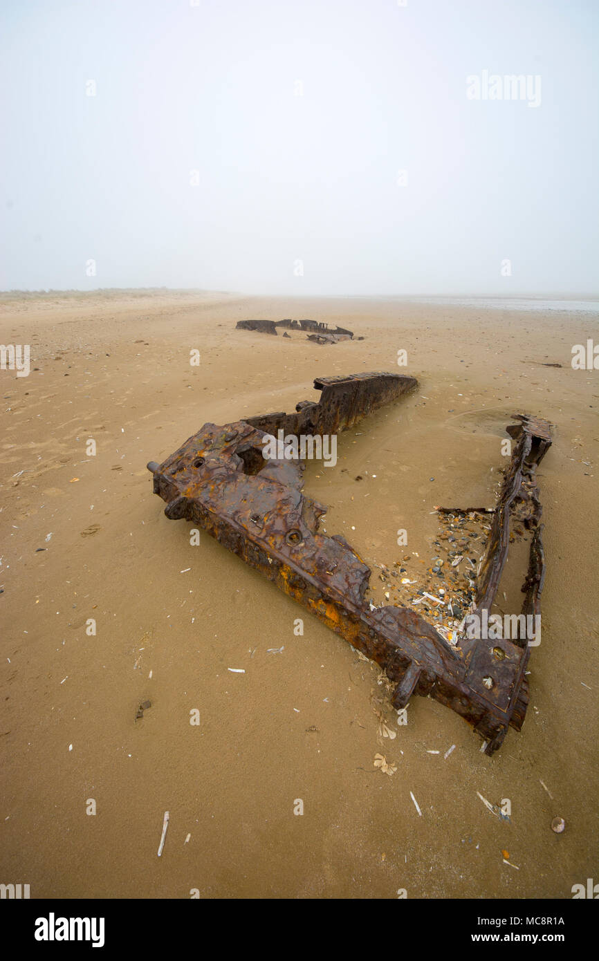 A pair of Covenanter tanks, half-buried in the beach at Titchwell Stock ...