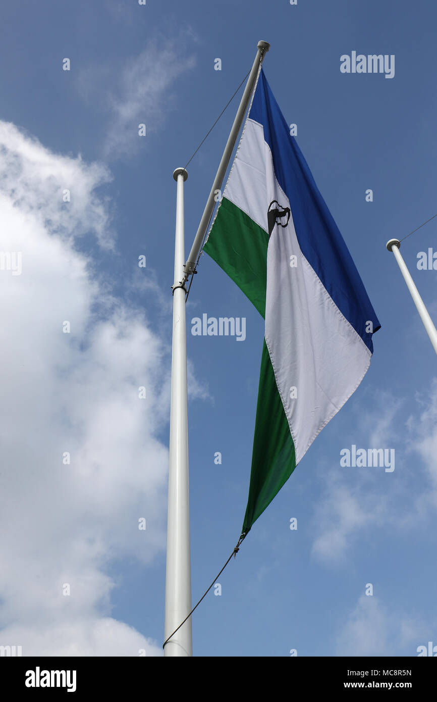 The flag of Lesotho flies with other flags from countries of the ...