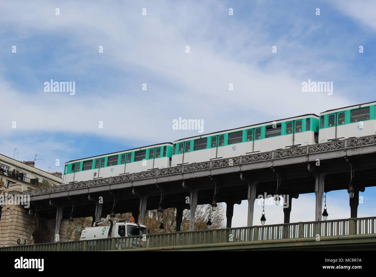 Wide shot of a RAPT metro train crossing a bridge in Paris Stock Photo ...