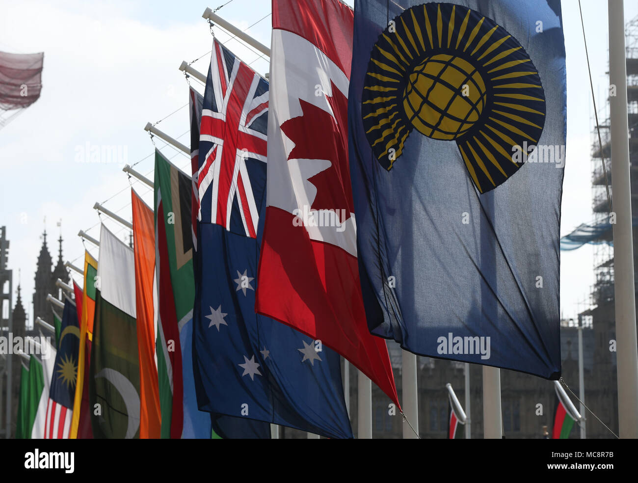 Flags of countries from the commonwealth flying in parliament square hi ...