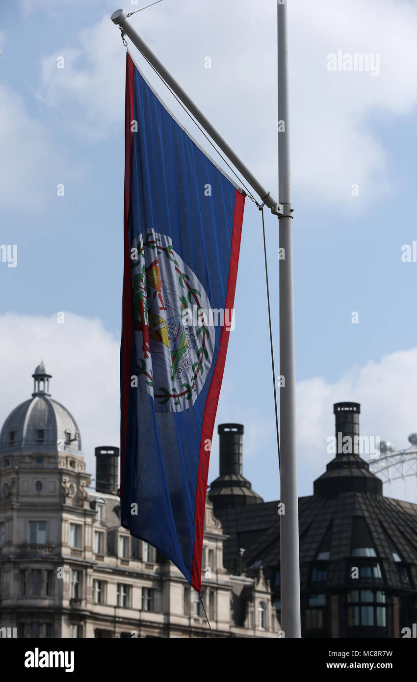 The flag of Belize flies with other flags from countries of the ...