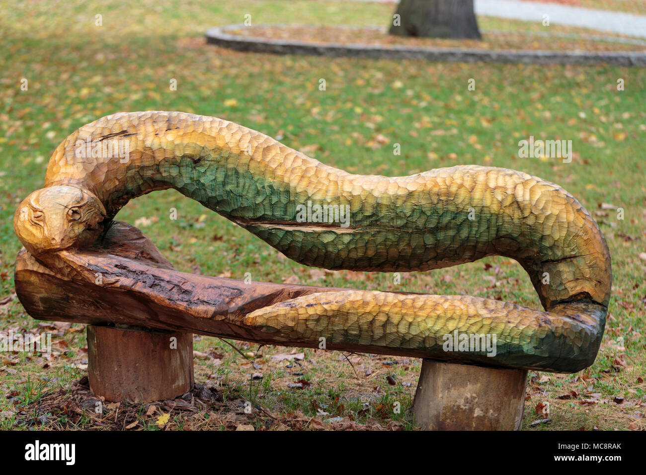the bench in the park with the back in the form of the snake Stock ...