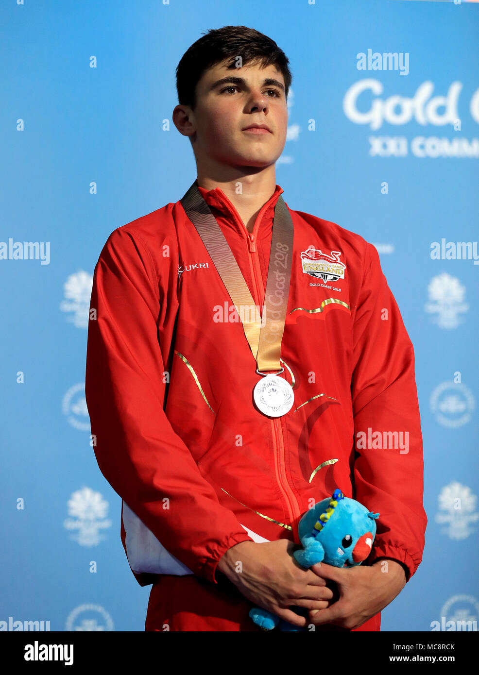 England's Matthew Dixon celebrates with his silver medal in the Men's ...