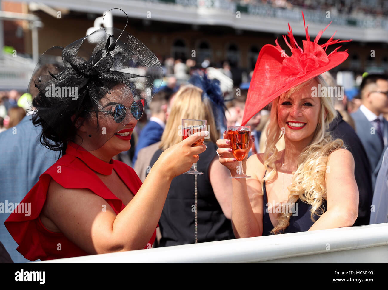 Female racegoers track side during Grand National Day of the 2018 ...