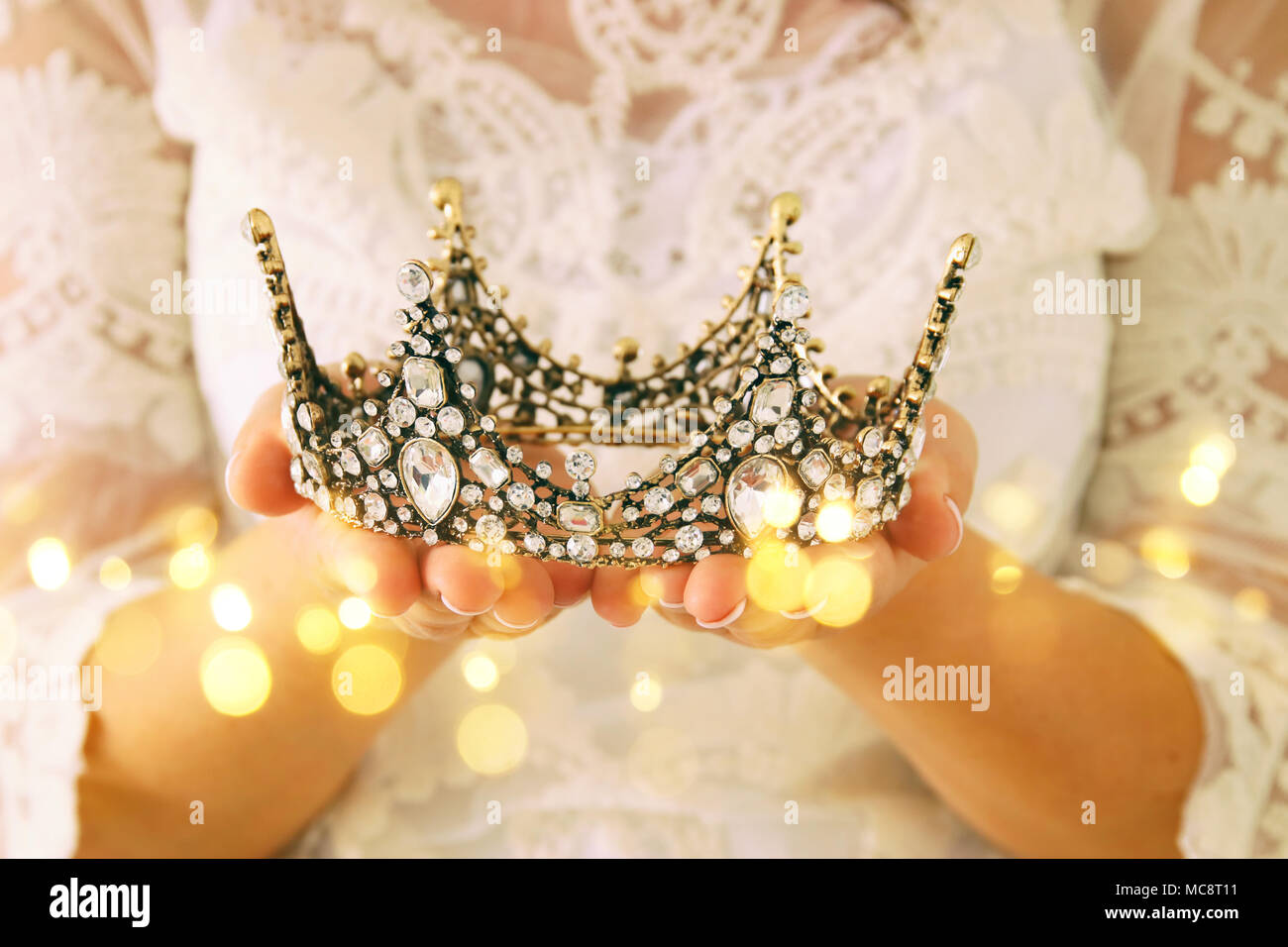 image of beautiful lady with white lace dress holding diamond crown ...
