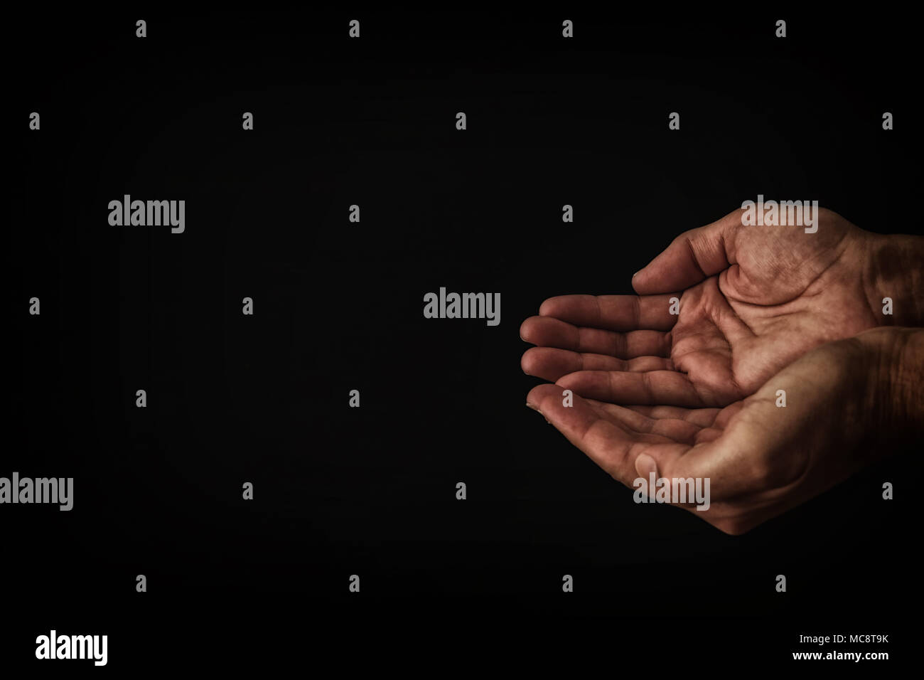 image of open male hand begging for help Stock Photo - Alamy