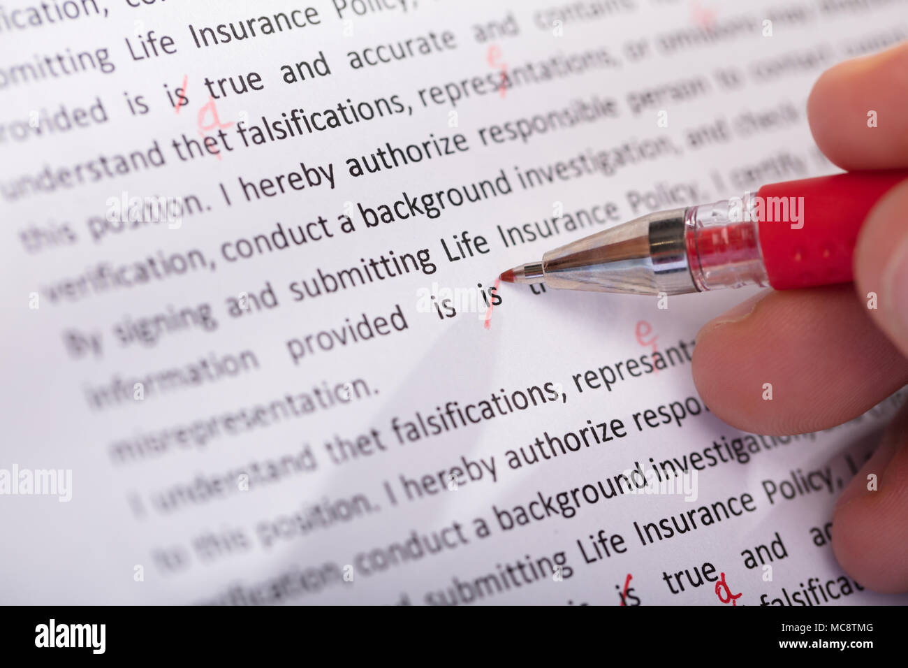 Person's Hand Marking Error During Spellchecking Text Stock Photo - Alamy