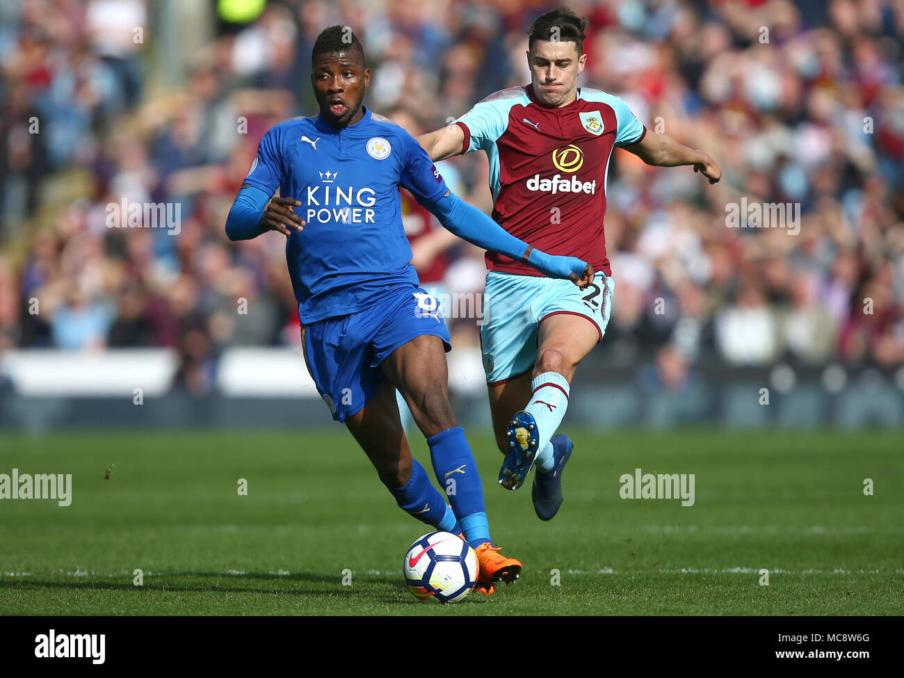 Leicester City's Kelechi Iheanacho (left) and Burnley's Matthew Lowton ...