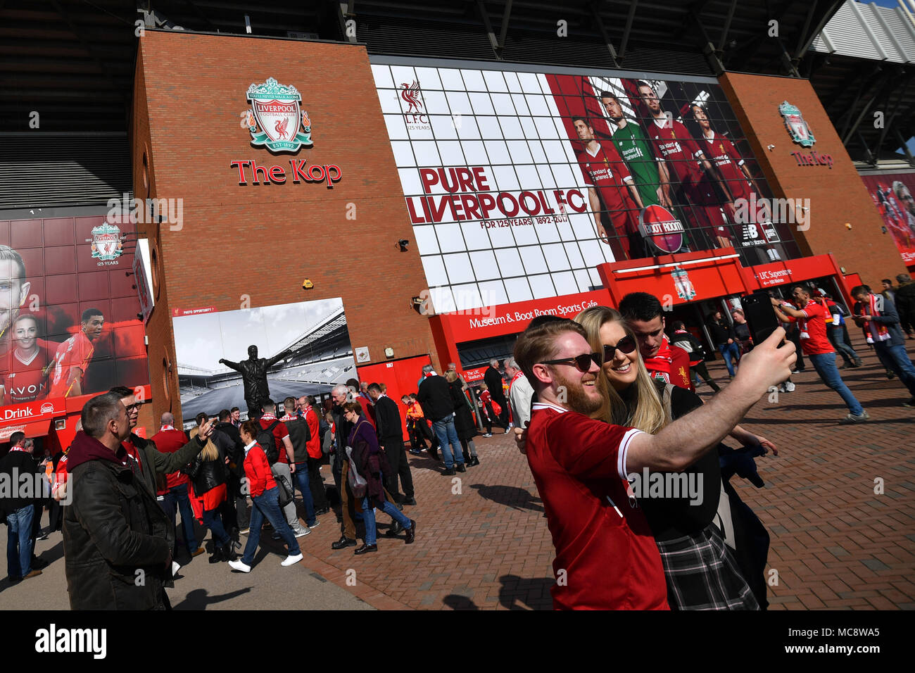 Fans arrive at Anfield ahead of the Premier League match at Anfield ...
