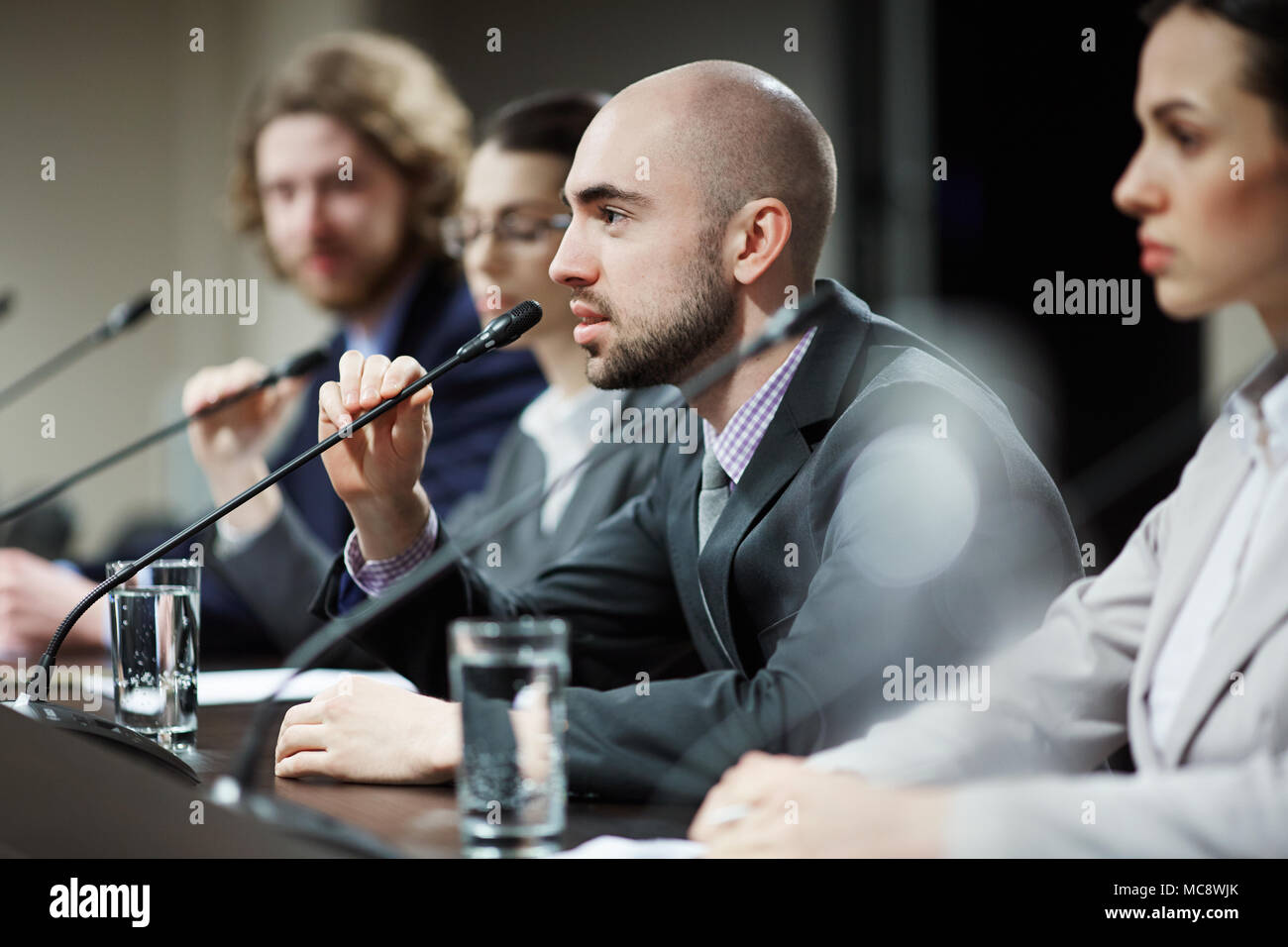 Person talking conference podium hi-res stock photography and images ...