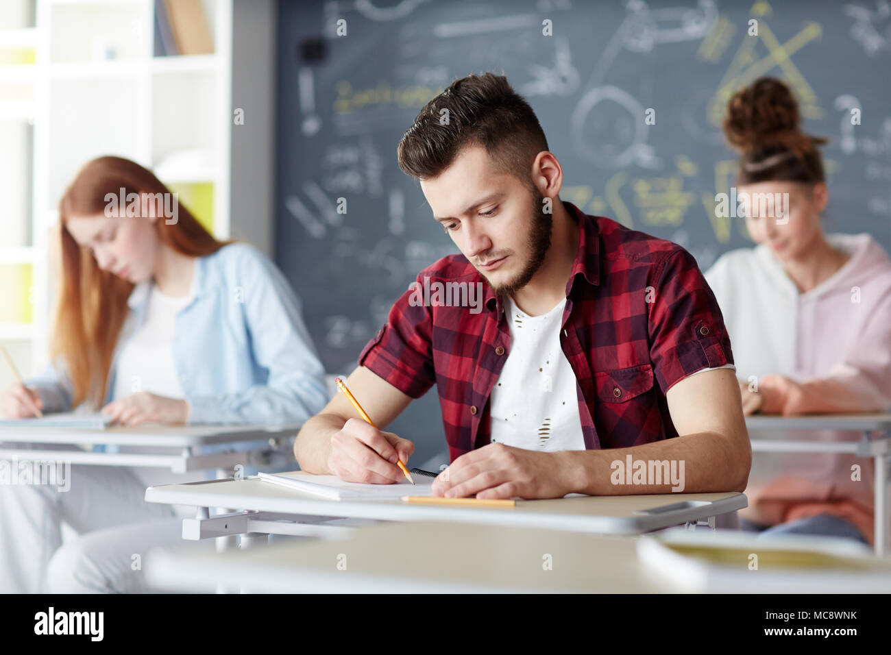 Exam desks hi-res stock photography and images - Alamy
